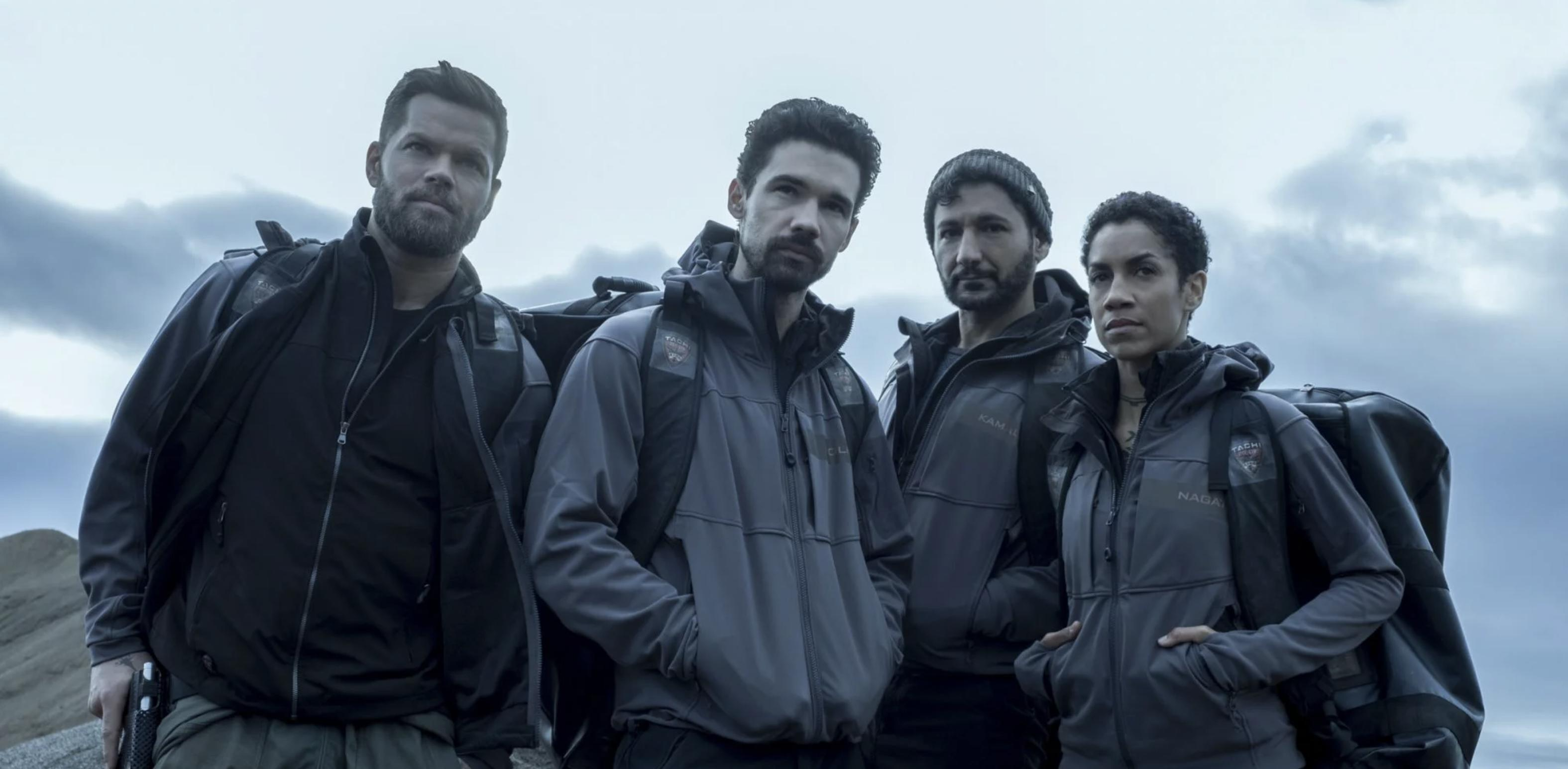 A still from season four of The Expanse picturing Amos Burton, Jim Holden, Alex Kamal, and Naomi Nagata