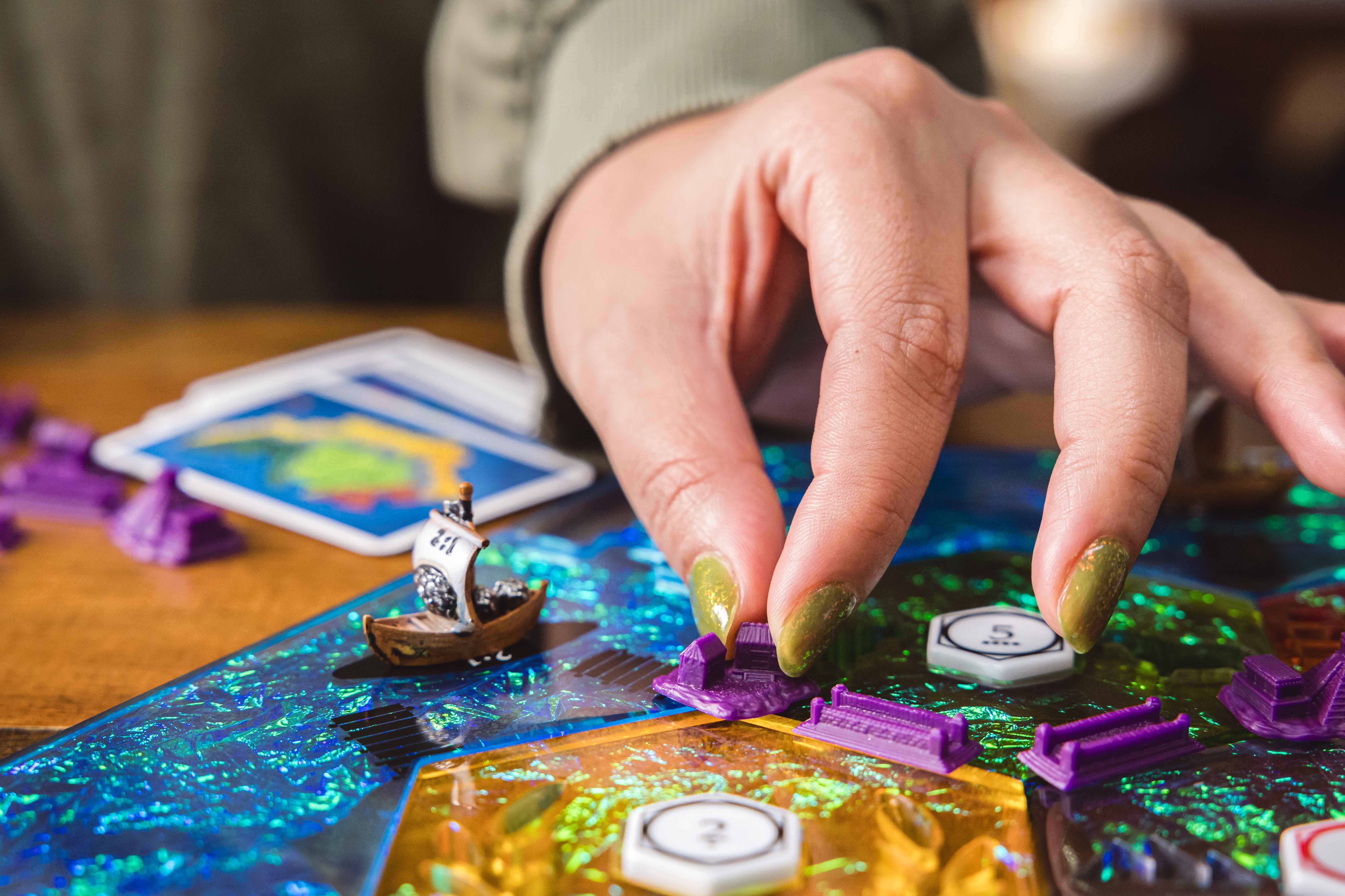 Upgrade your Catan with metal and wooden pieces with this Kickstarter