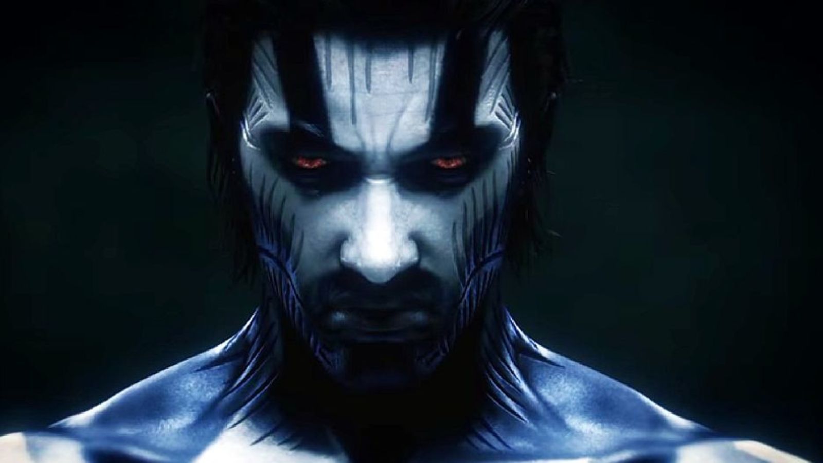 A pale, angry man stares directly at the viewer, his eyes red.