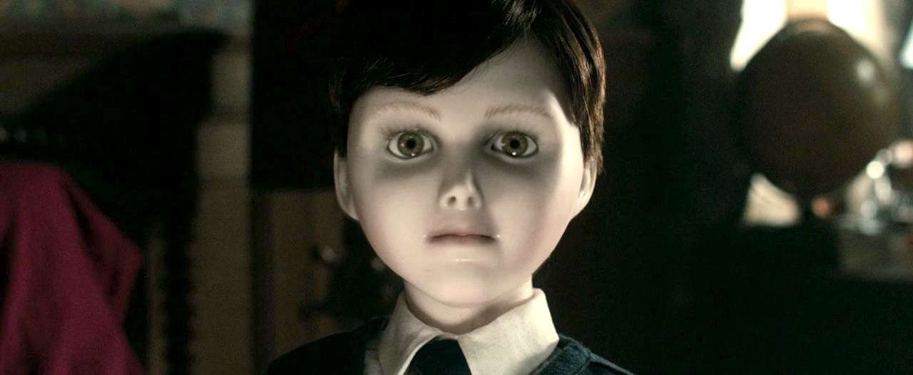 Brahms (The Boy) doll stares at camera in the creepiest way imaginable
