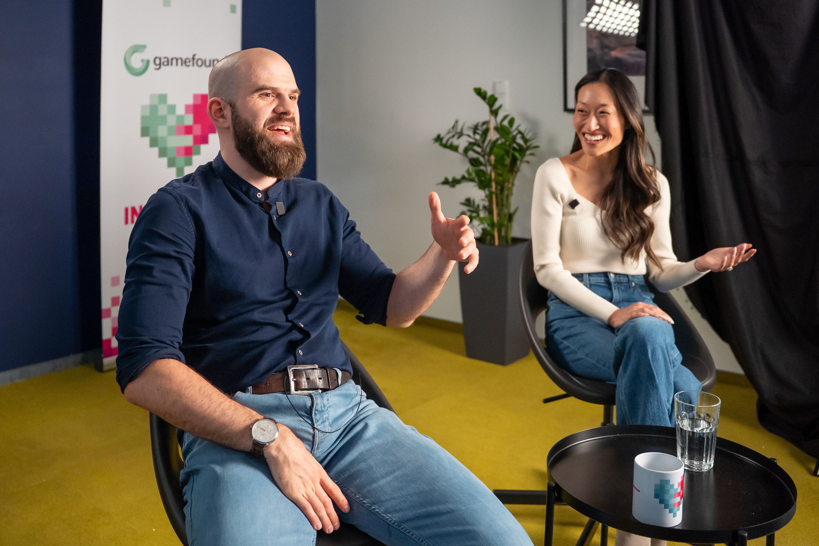 Marcin Świerkot, CEO of Gamefound sits next to Julie dePontbriand, CEO of Indiegogo