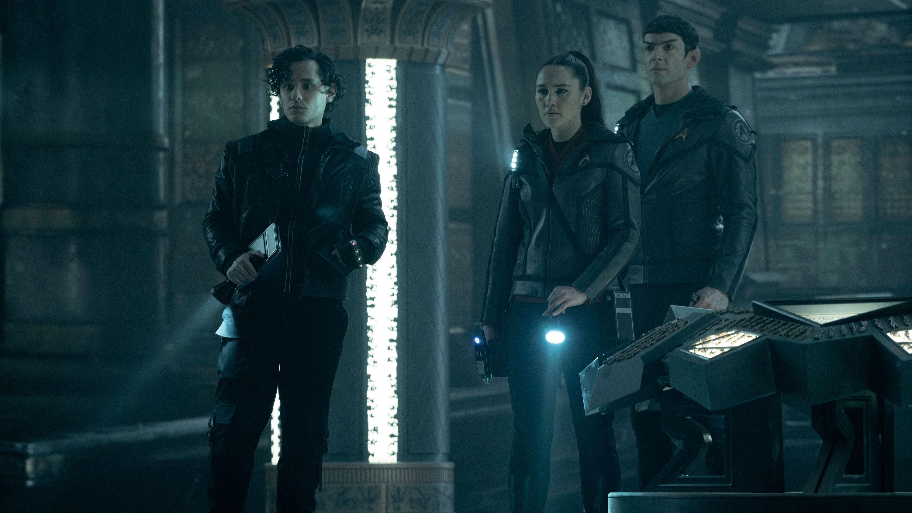 Mynor Luken as Beto, Christina Chong as Laían and Ethan Peck as Spock explore an alien temple in Star Trek: Strange New Worlds